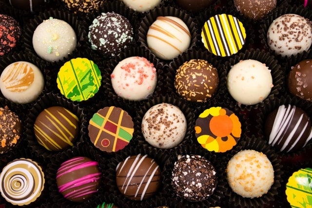 Chocolate boxes containing a variety of truffles available from the ...
